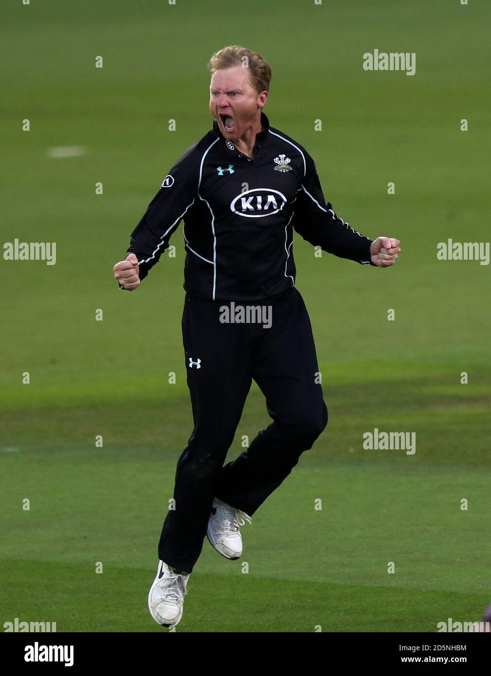 Surrey's Gareth Batty celebrates taking the wicket of Gloucestershire's ...