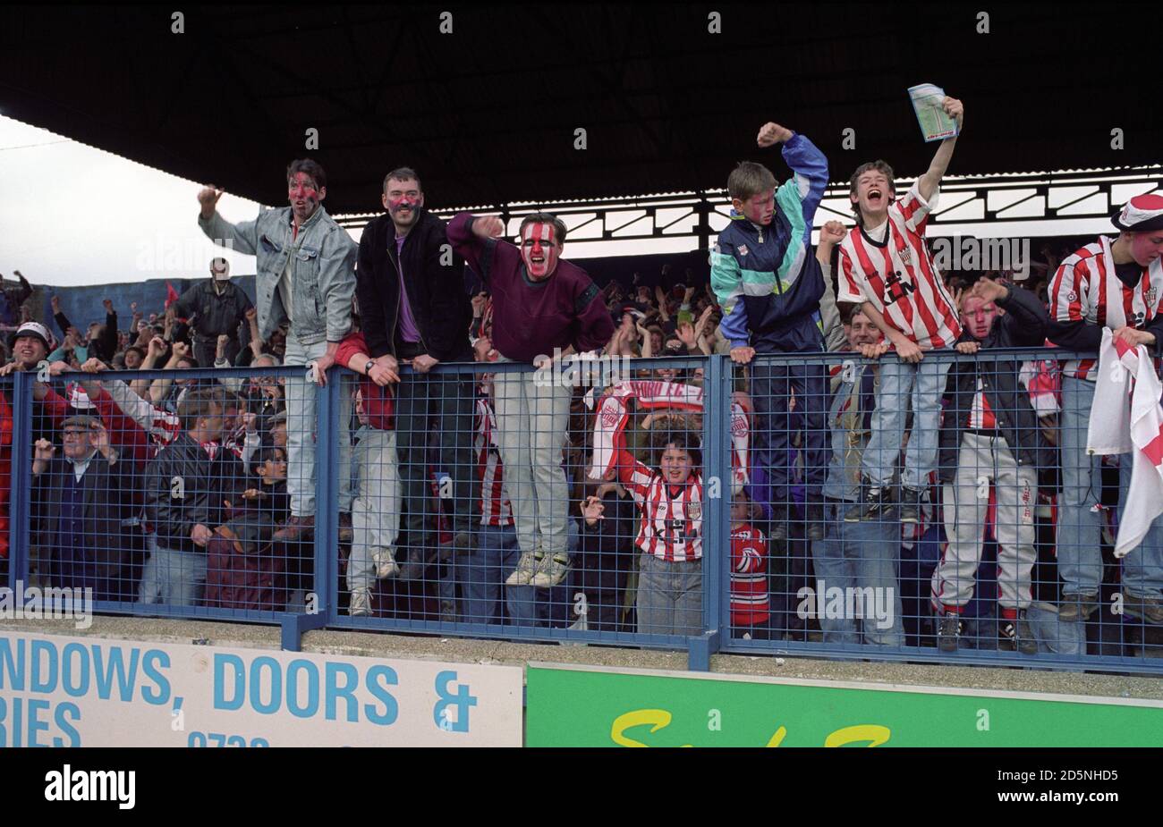 Brentford fans celebrating their team winning promotion Stock Photo - Alamy