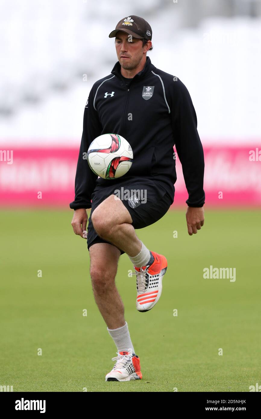 Surrey's Mark Footitt plays football during the warm up Stock Photo - Alamy