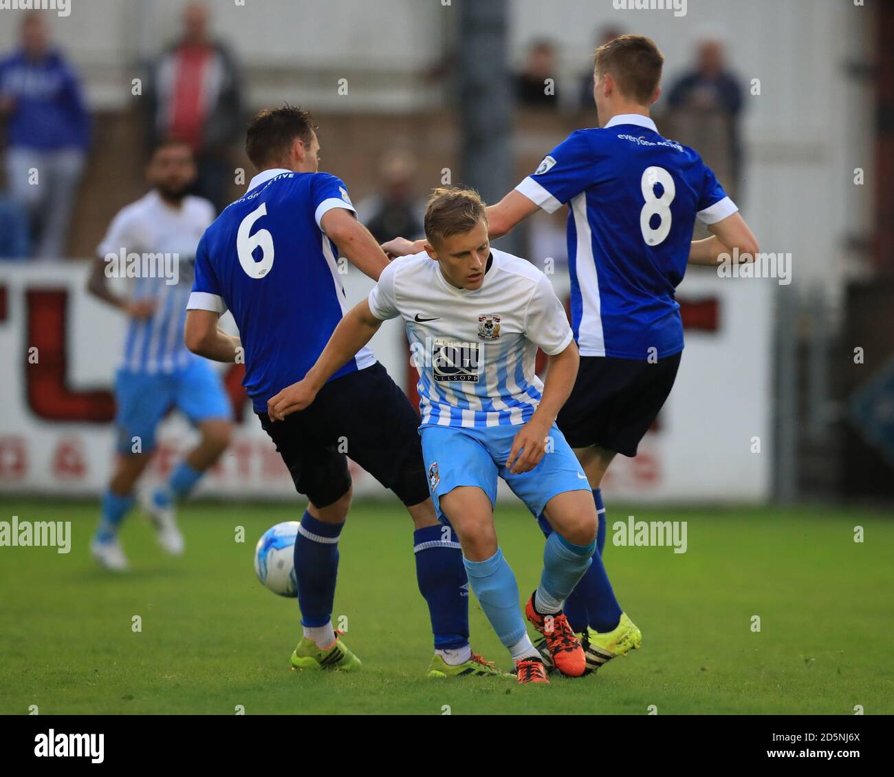 Coventry City's George Thomas and Nuneaton Town's Jordan keane and Iwan ...