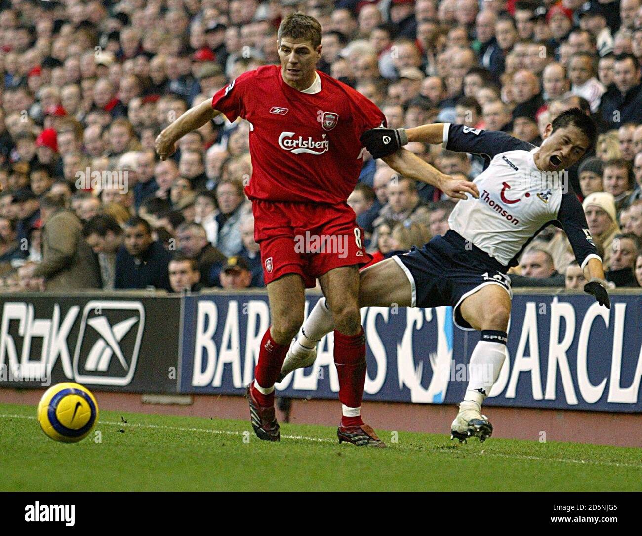 (L-R) Liverpool's Steven Gerrard and Tottenham Hotspur's Young-Pyo Lee ...