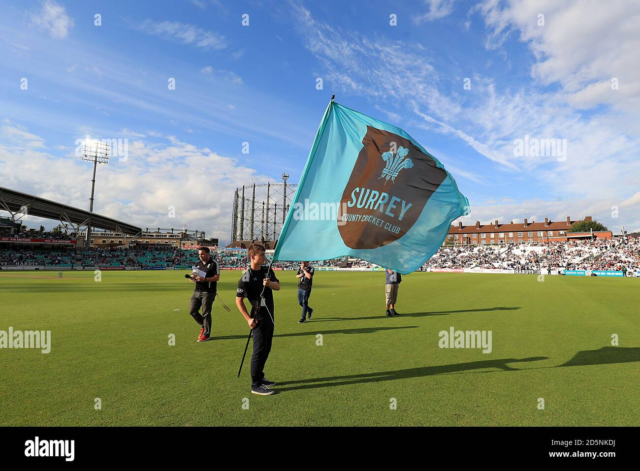 A Surrey flag is waved on the pitch prior to the match Stock Photo - Alamy