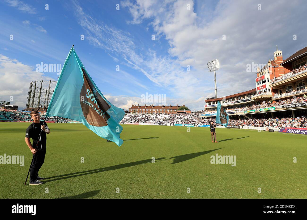 A Surrey flag is waved on the pitch prior to the match Stock Photo - Alamy