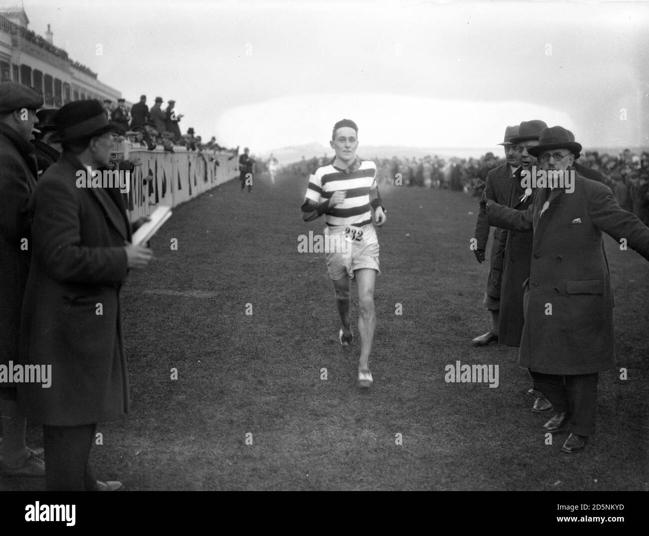 S.A. Tomlin, the smiling winner, of the Highgate Harriers, who won the ...