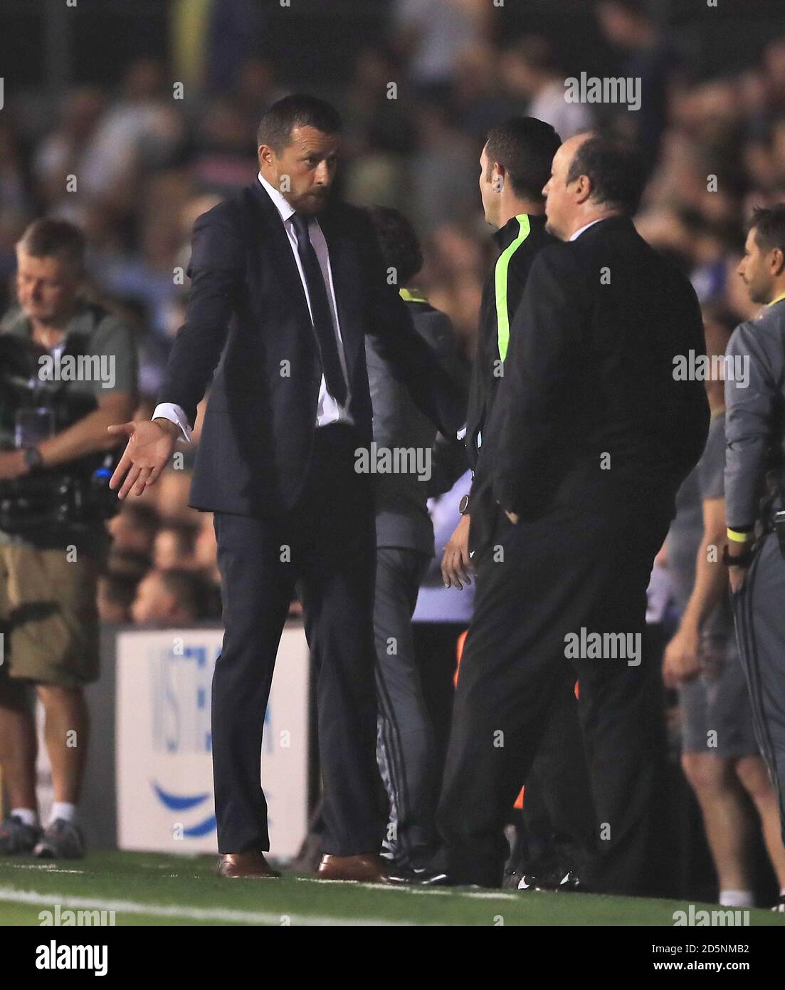 Fulham manager Slavisa Jokanovic (left) appeals to the fourth official ...