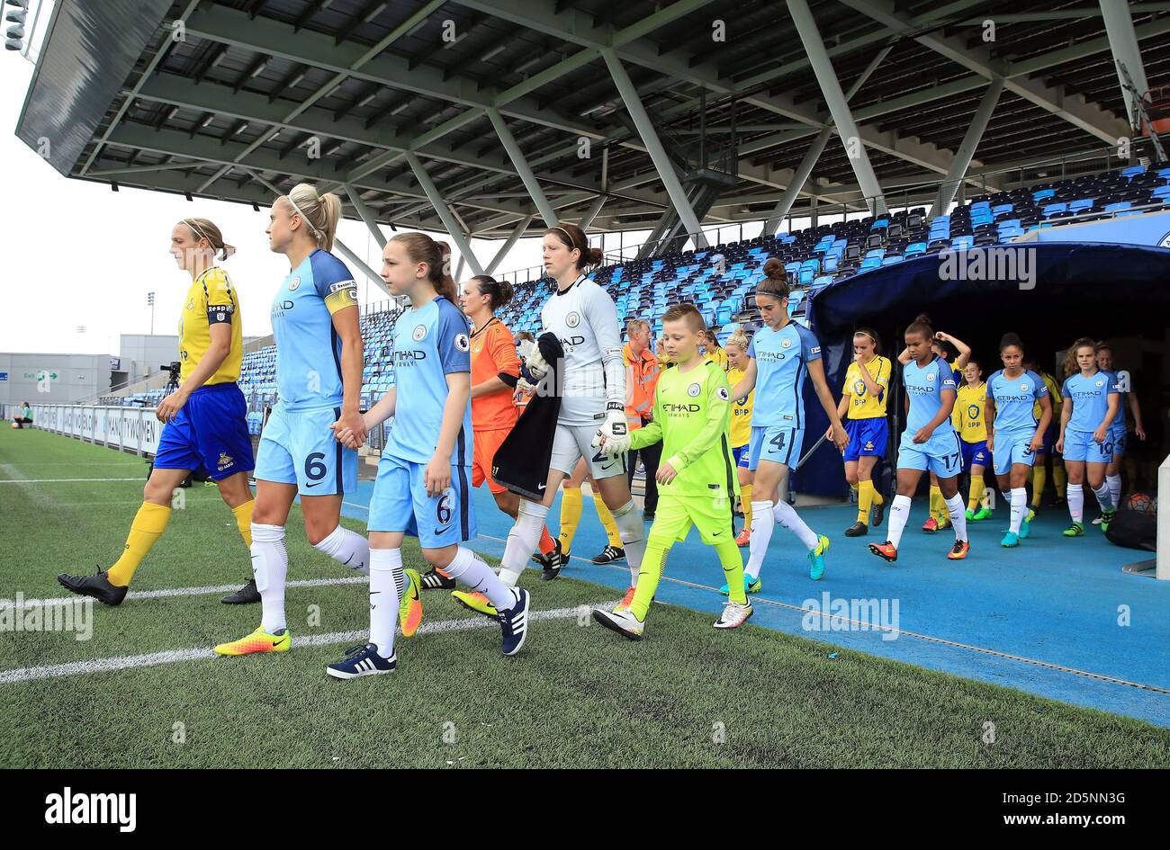 Manchester City Women's team with their match day mascots Stock Photo ...