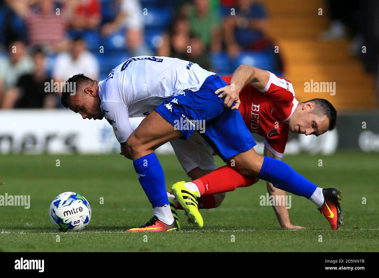 Bury's Zeli Ismail and Chartlon Athletic's Andrew Crofts battle for the ...