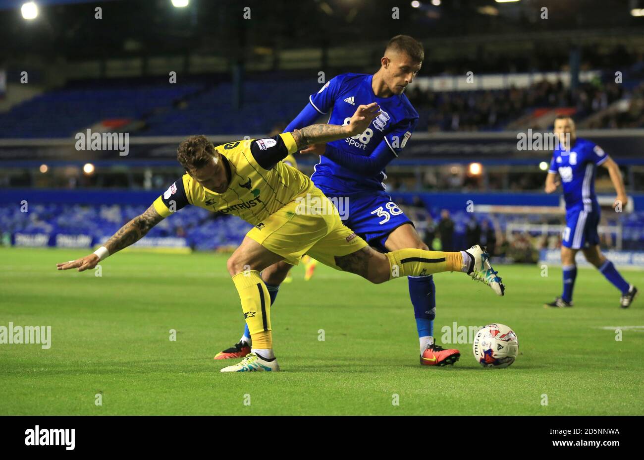 Birmingham City's Jack Storer (right) and Oxford United's Chris Maguire ...