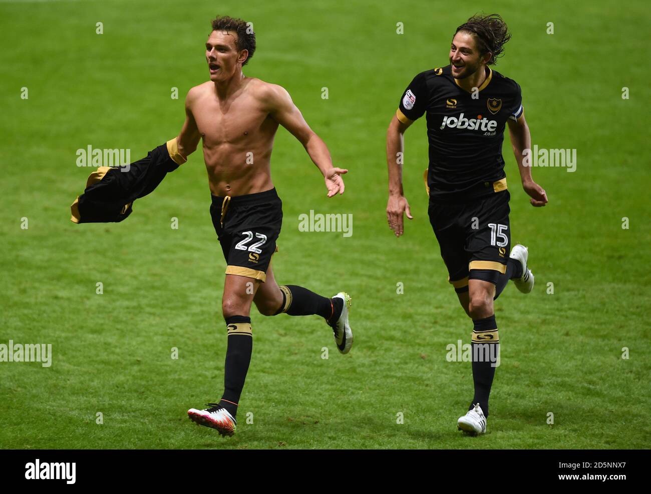 Portsmouth's Kai Naismith (left) celebrates scoring the equalising goal ...