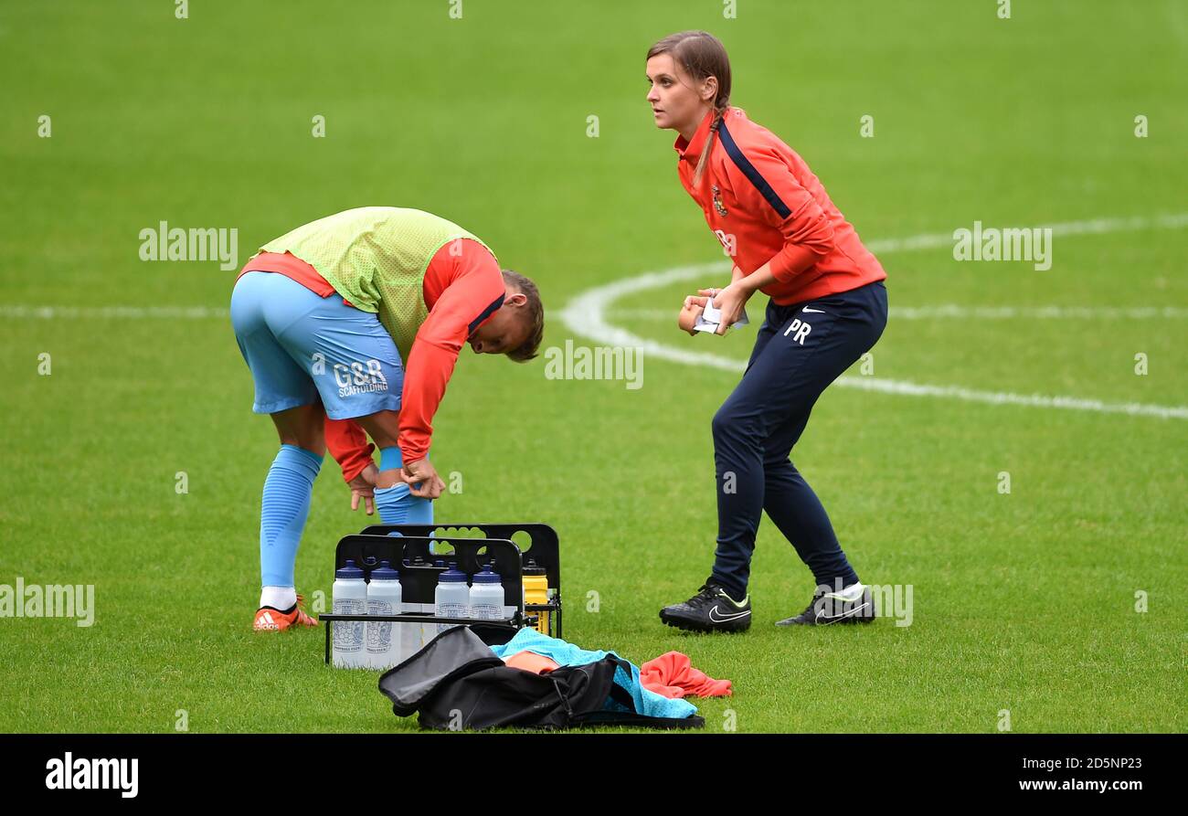 Coventry City physiotherapist Pauline Robertson (right) treats Ben ...