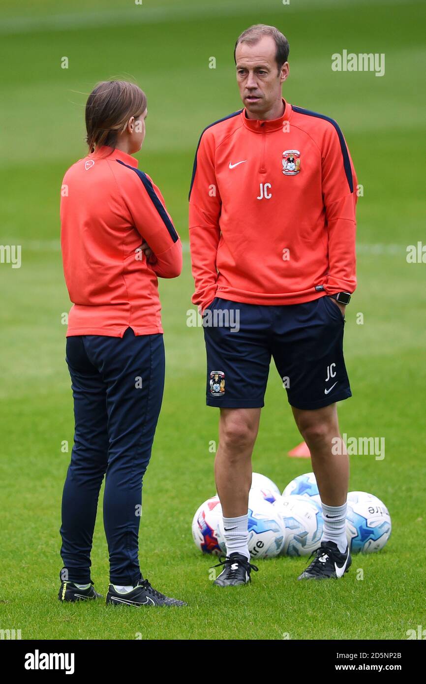 Coventry City first team coach Jamie Clapham (right) and ...