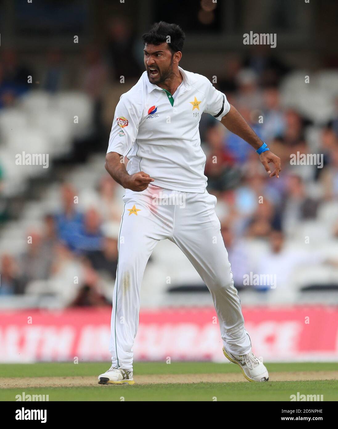Pakistan's Sohail Khan celebrates taking the wicket of England's Stuart ...