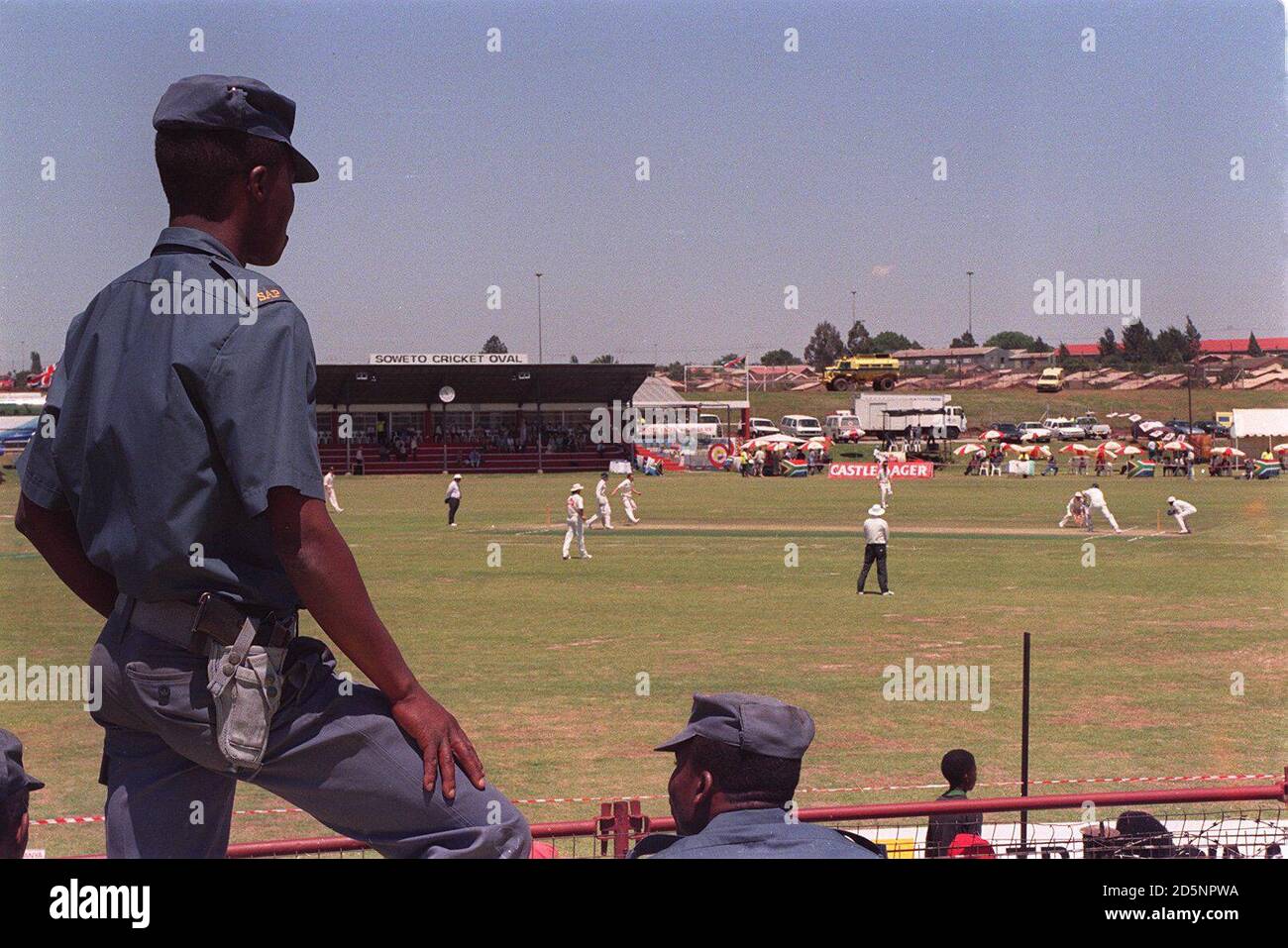 Armed police overlooking the Soweto Oval Stock Photo - Alamy