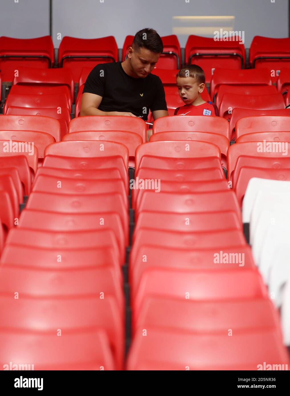 Fans sit in stands hi-res stock photography and images - Alamy