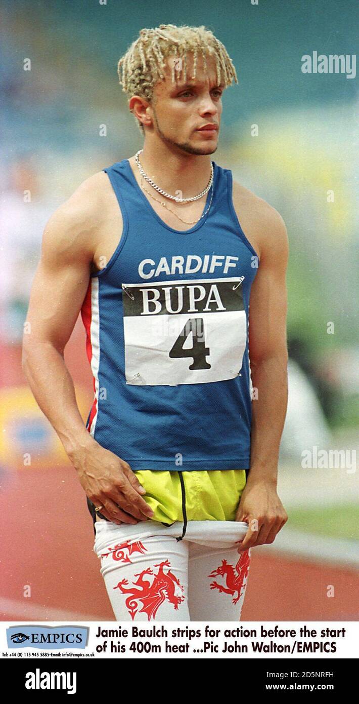 Jamie Baulch strips for action before the start of his 400m heat Stock ...