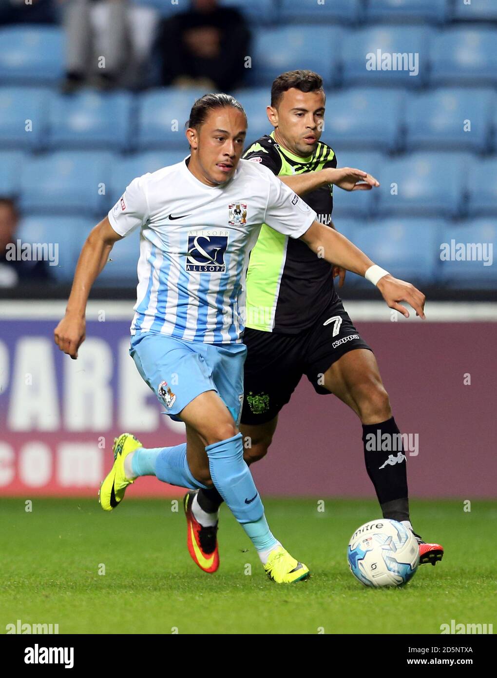 Coventry City's Jodi Jones (left) in action with Bury's Zeli Ismail ...