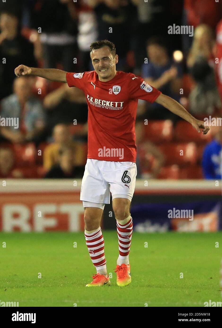 Barnsley's Josh Scowen (left) celebrates after the game against Queens ...