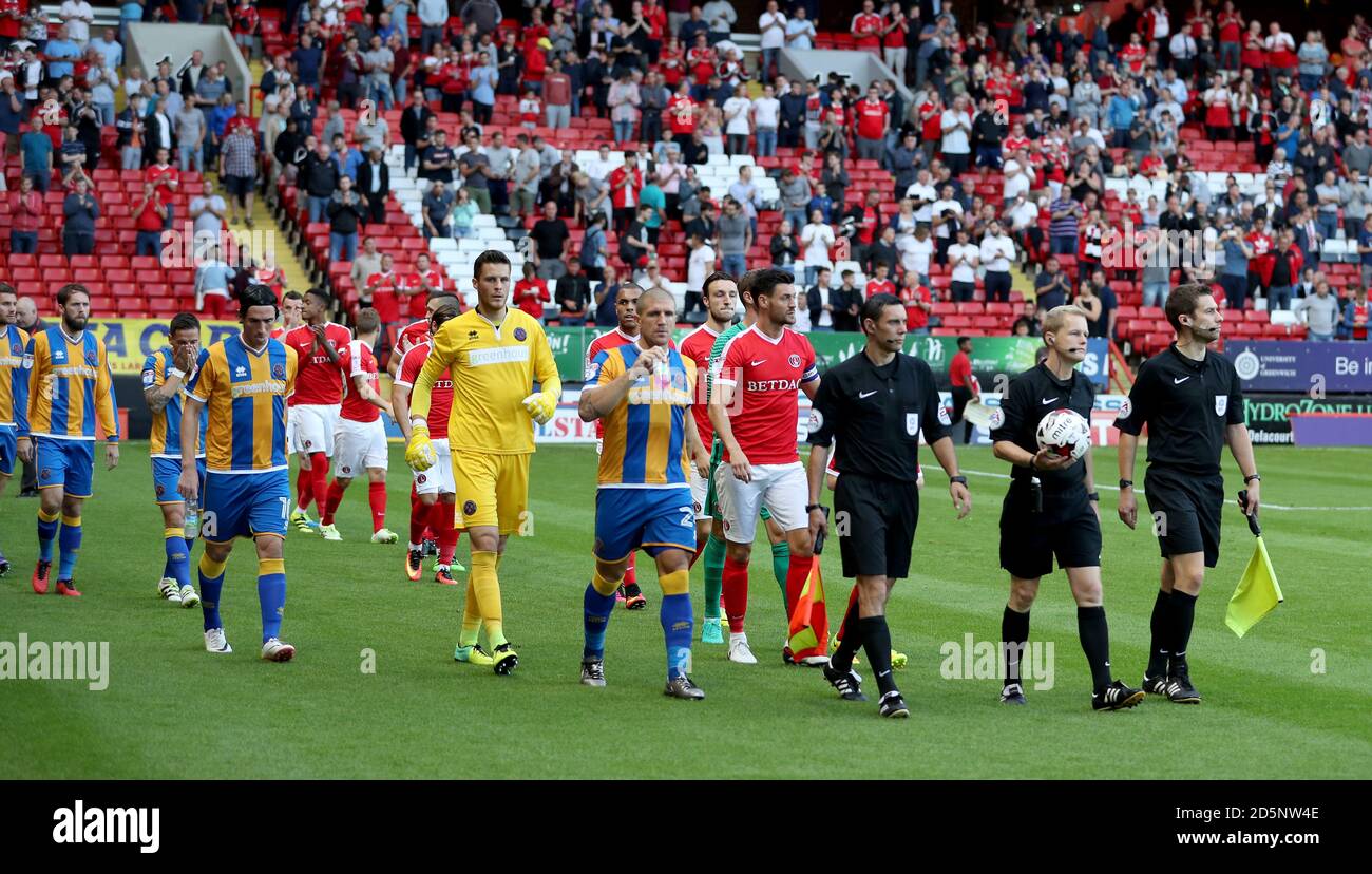 The two team's walk out before kick-off Stock Photo - Alamy