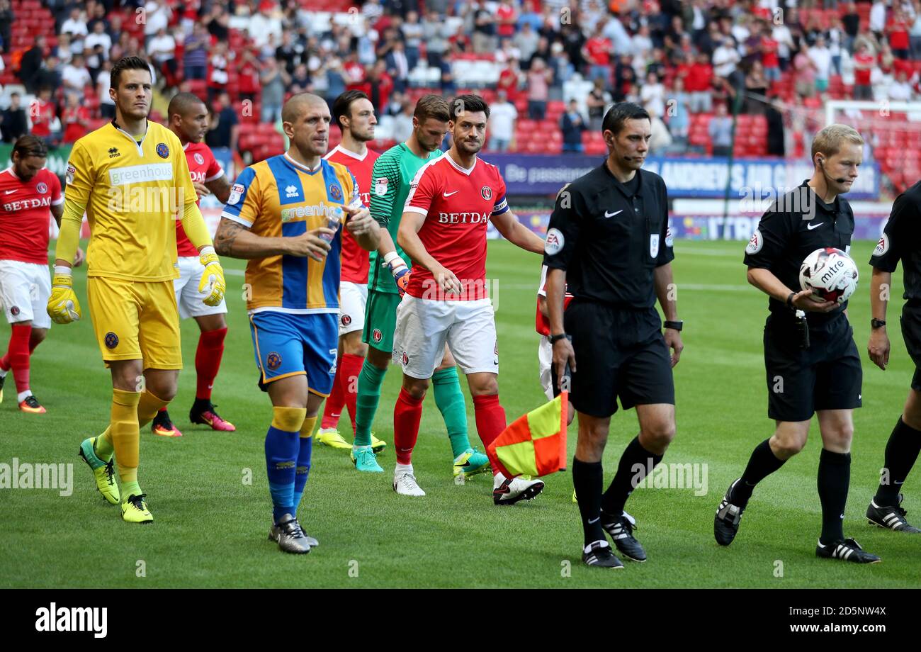 The two team's walk out before kick-off Stock Photo - Alamy
