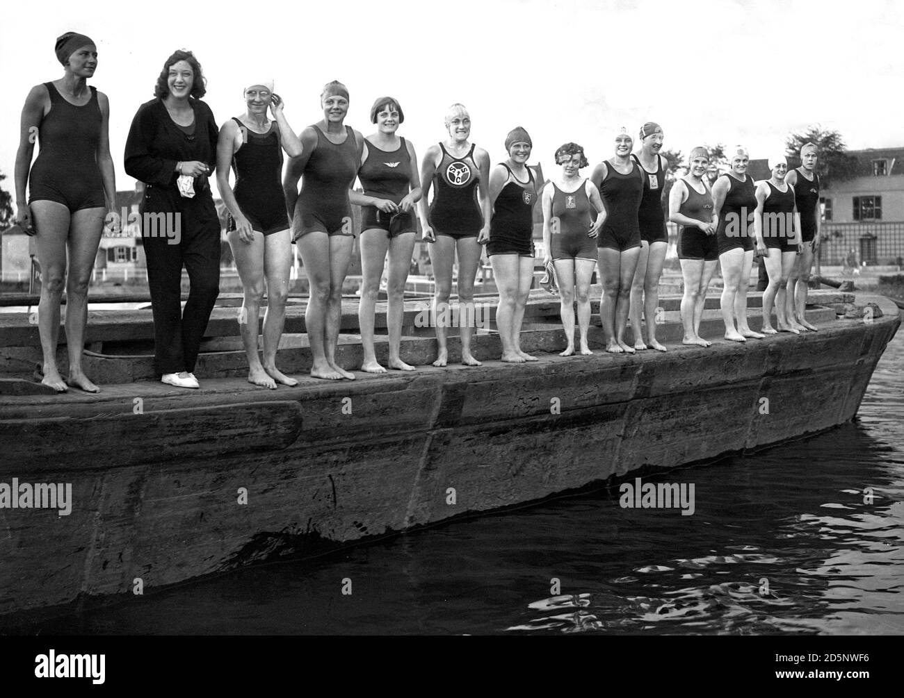 Fifteen women lined up across the River Thames at Kew for the annual ...