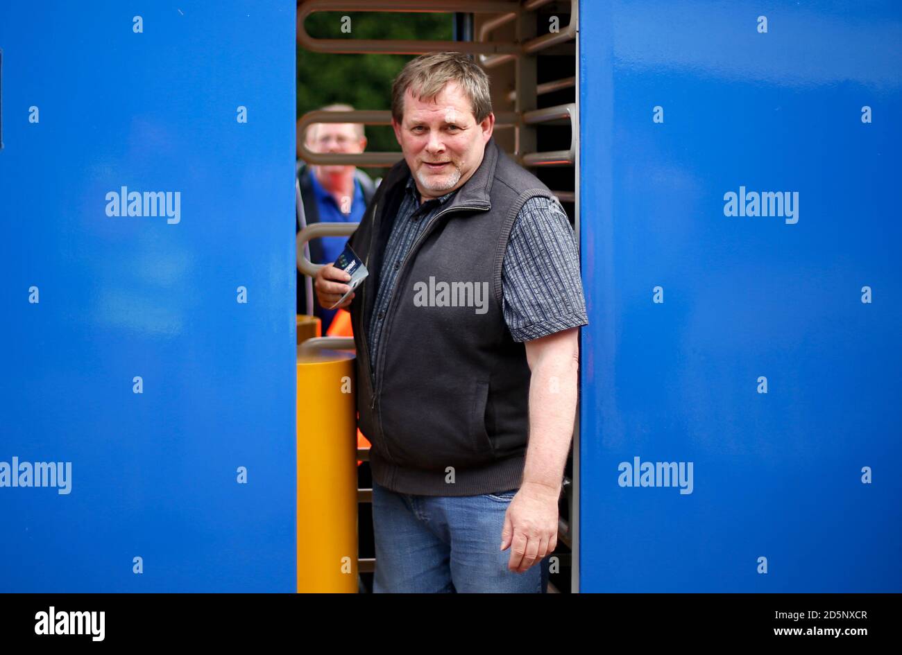 Fans make their way through the turnstiles at St Andrews Stock Photo ...