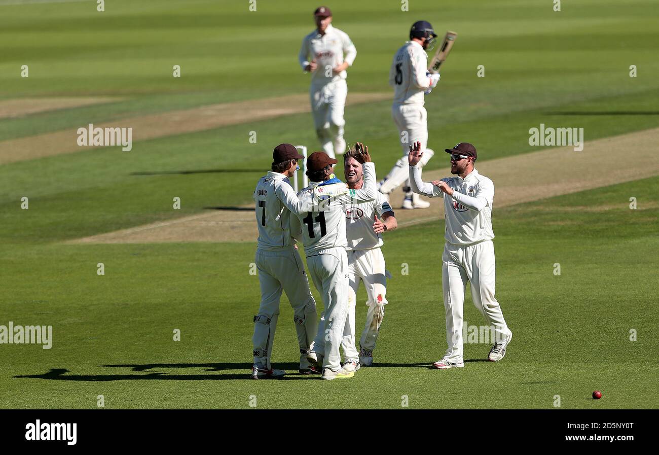 Surrey's bowler Stuart Meaker celebrates after Kumar Sangakkara catches ...