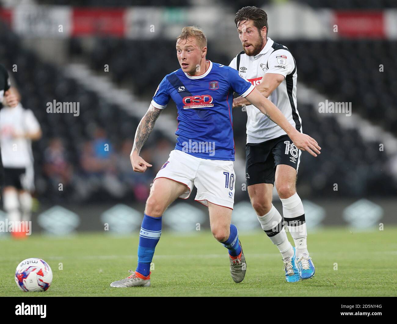 Derby County's Jacob Butterfield and Carlisle United's Nicky Adams ...