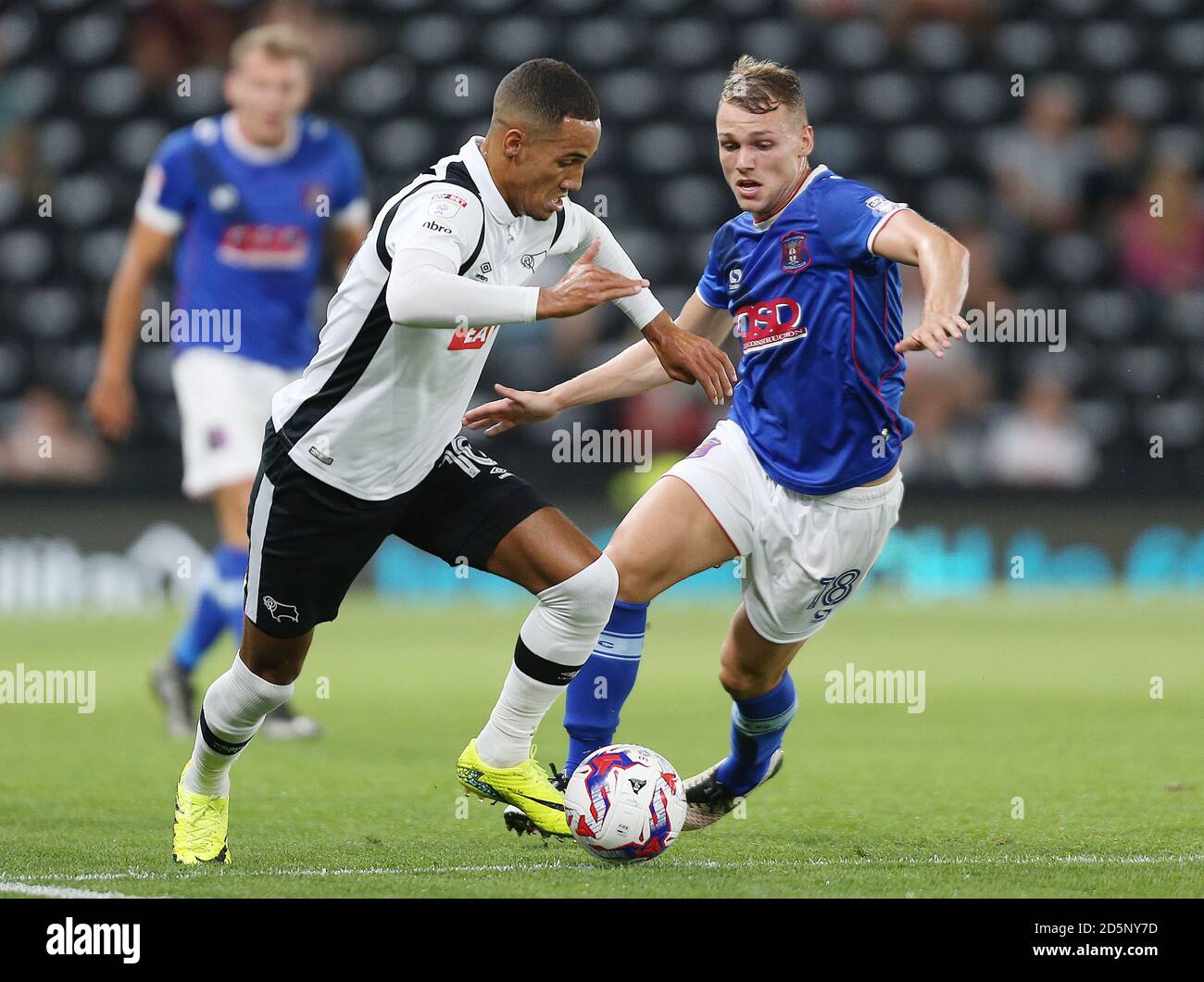 Derby County's Tom Ince (left) and Carlisle United's Joe McKee battle ...