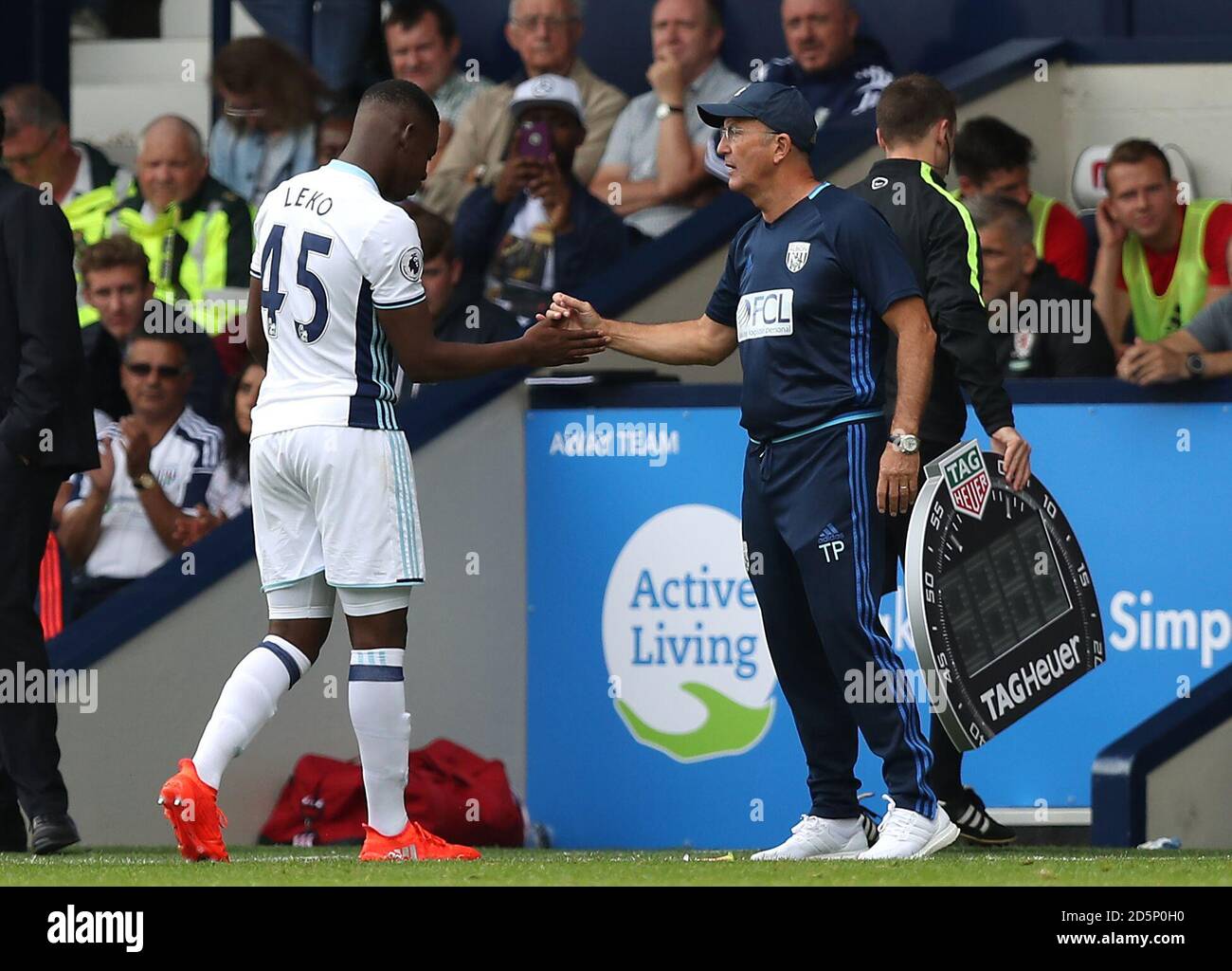 West Bromwich Albion's Jonathan Leko shakes hands with manager Tony ...