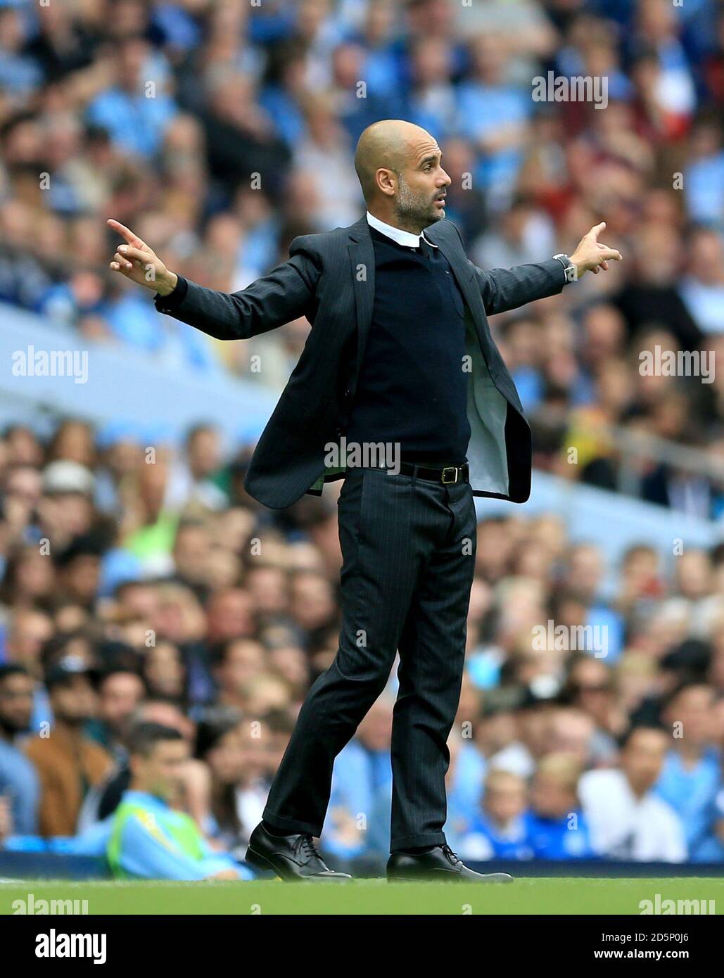 Manchester City manager Pep Guardiola gestures on the touchline Stock ...