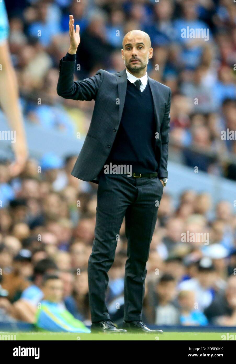 Manchester City manager Pep Guardiola gestures on the touchline Stock ...