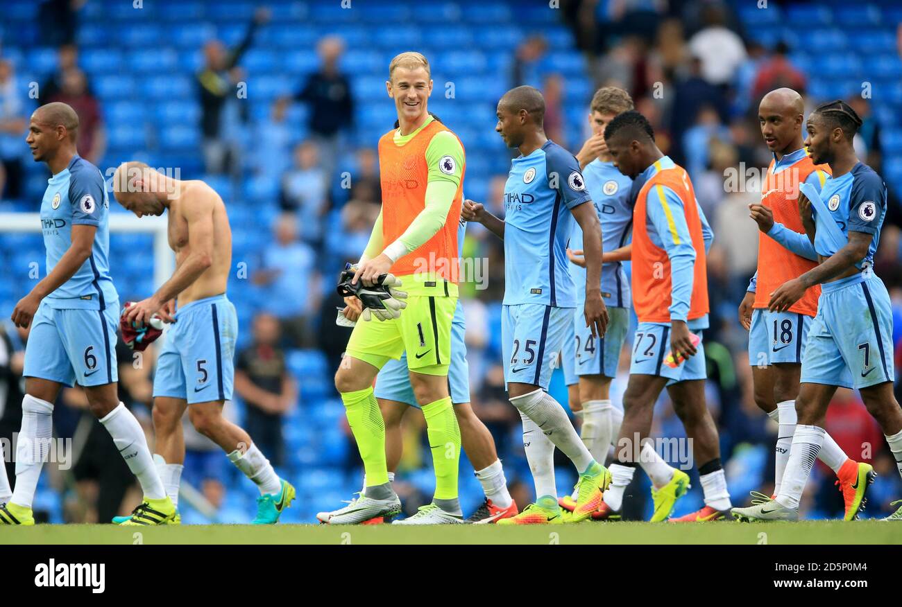 Manchester City goalkeeper Joe Hart on the pitch with his teammates ...