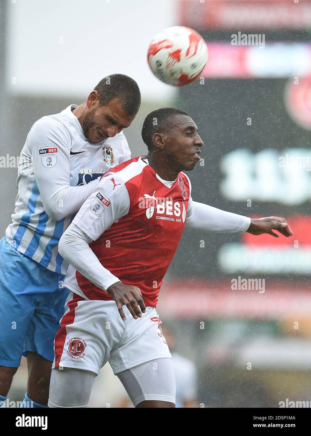Fleetwood Town's Amari'i Bell and Coventry City's Marcus Tudgay vie for ...