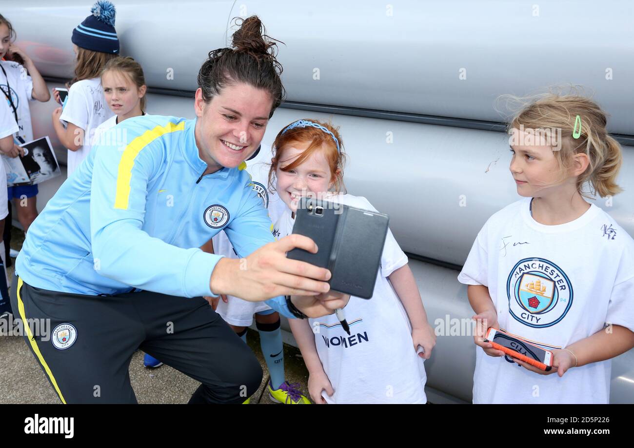 Manchester City Women's Jennifer Beattie signs autographs and poses for ...