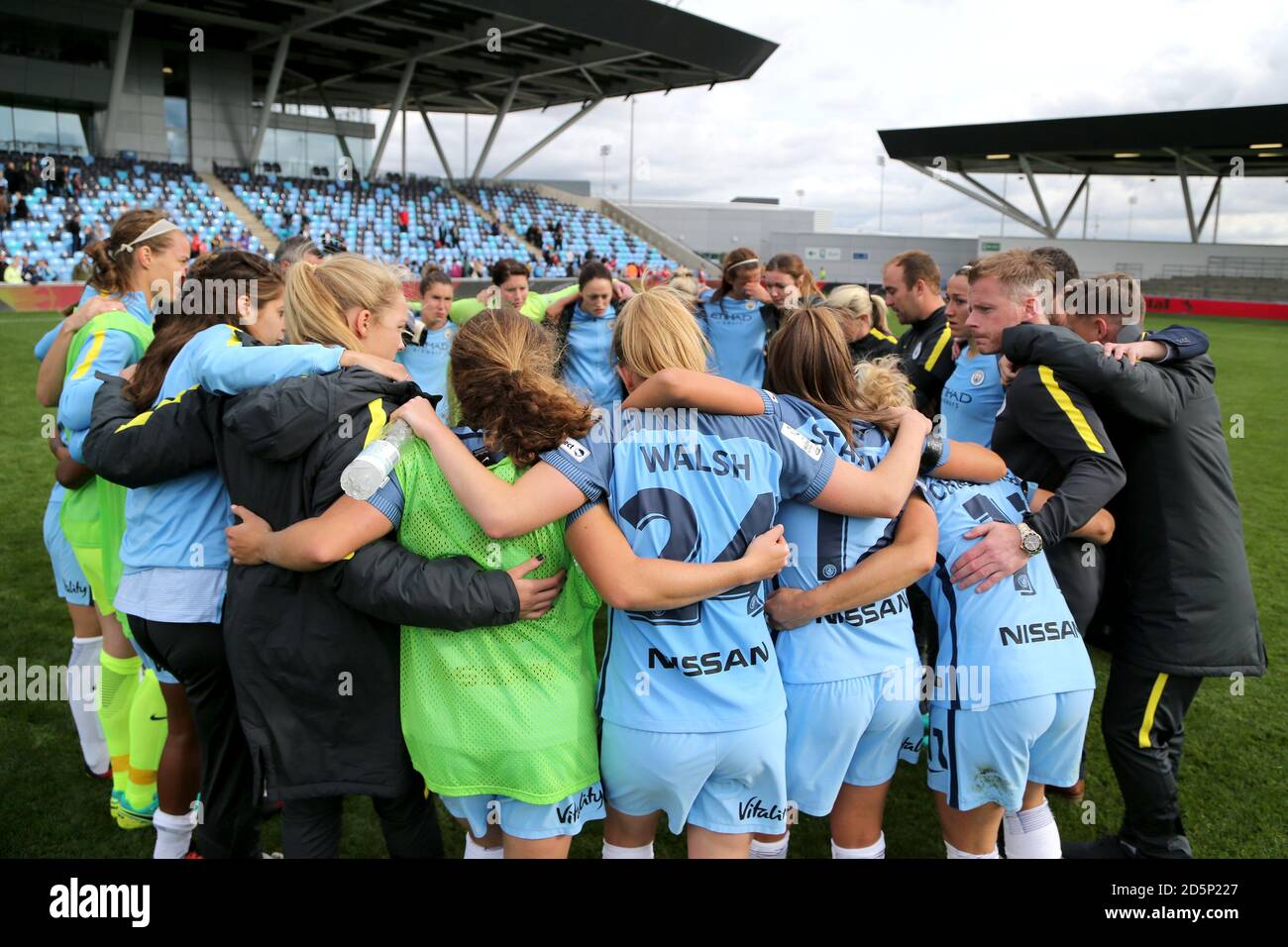 Manchester City Women players gather in a huddle after the match Stock ...