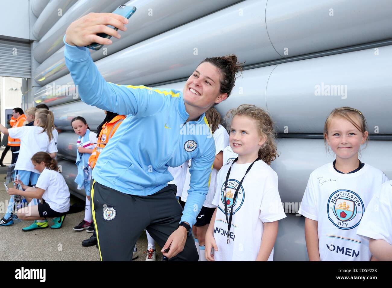 Manchester City Women's Jennifer Beattie signs autographs and poses for ...