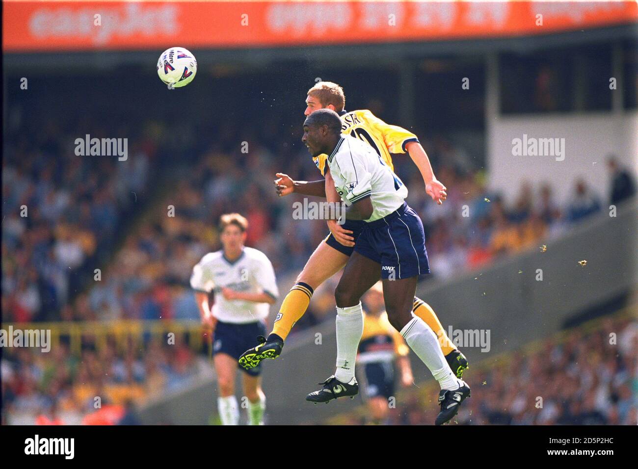 Tottenham Hotspur's Sol Campbell (front) and Sheffield Wednesday's Andy ...