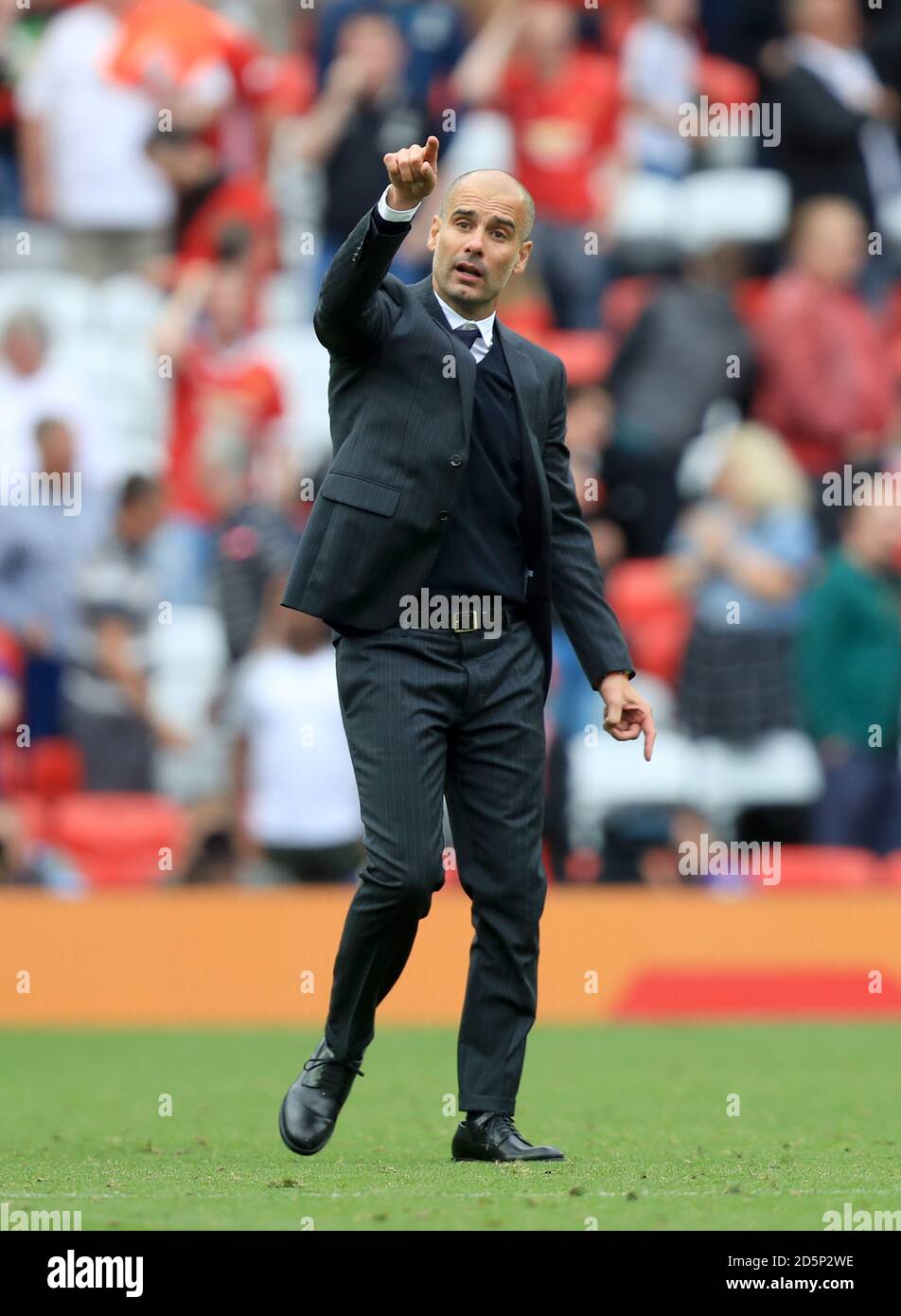 Manchester City manager Pep Guardiola salutes the fans after the final ...