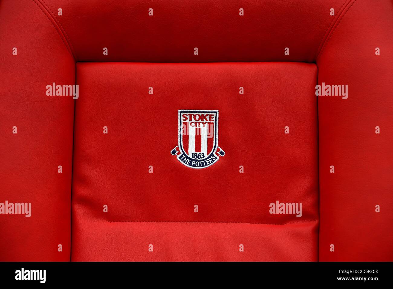 A general view of the Stoke City club badge on the substitute bench ...