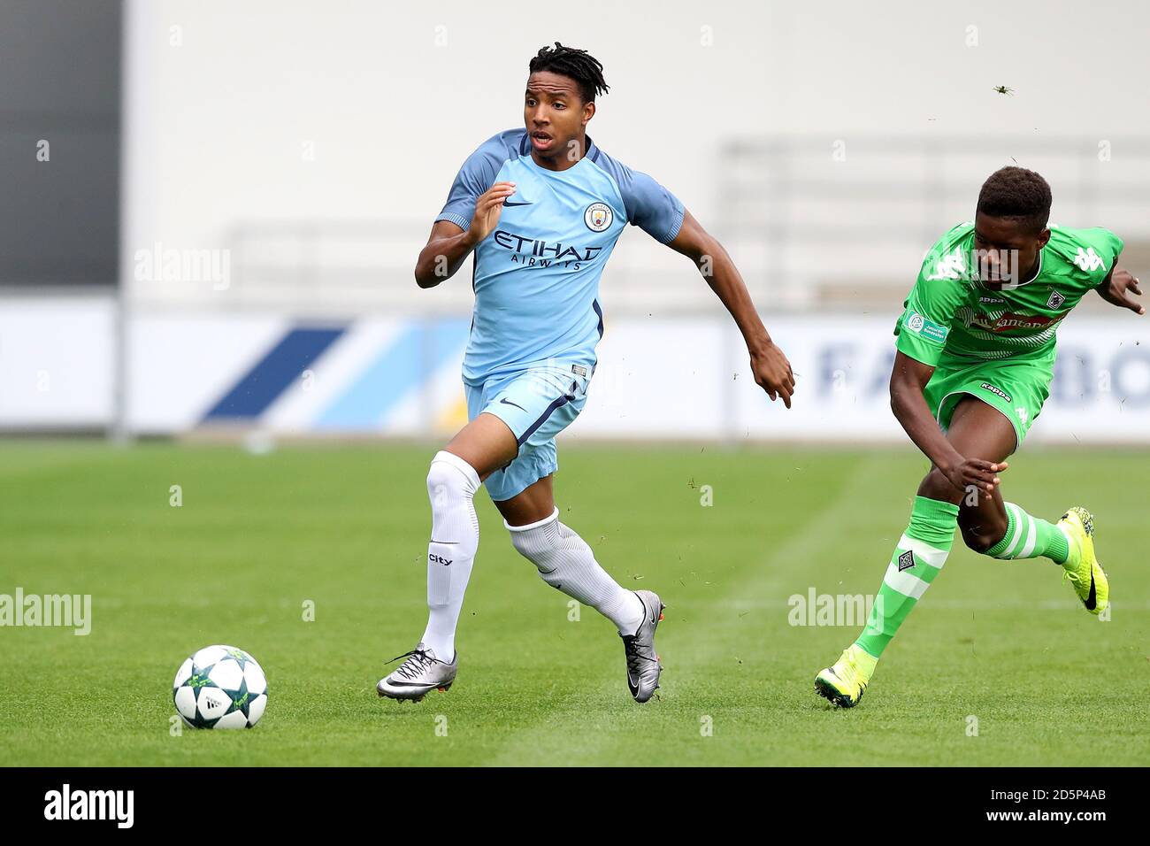 Manchester City's Demeaco Duhaney (left) in action Stock Photo - Alamy