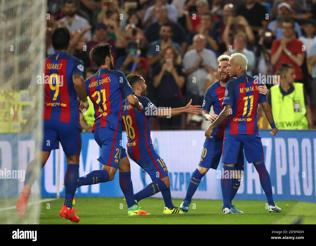 Barcelona's Lionel Messi (second from right) celebrates scoring his ...