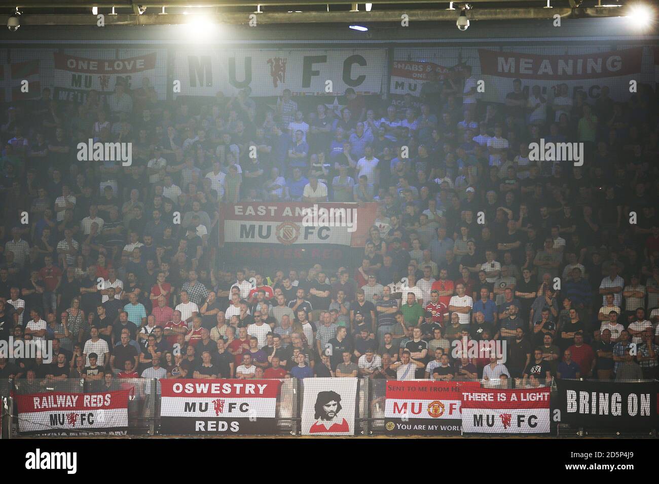 Manchester United fans in the stands Stock Photo - Alamy