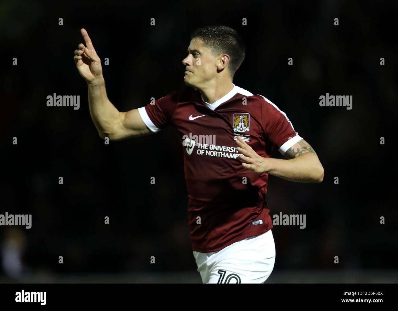 Northampton's Alex Revell celebrates scoring their first goal Stock ...