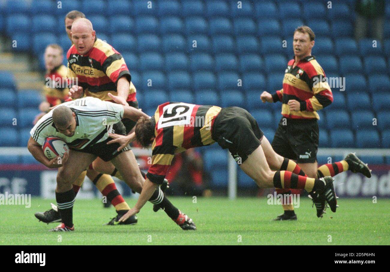 Newcastle's va'aiga Tuigamala hands off Richmond's Matt Pini Stock ...