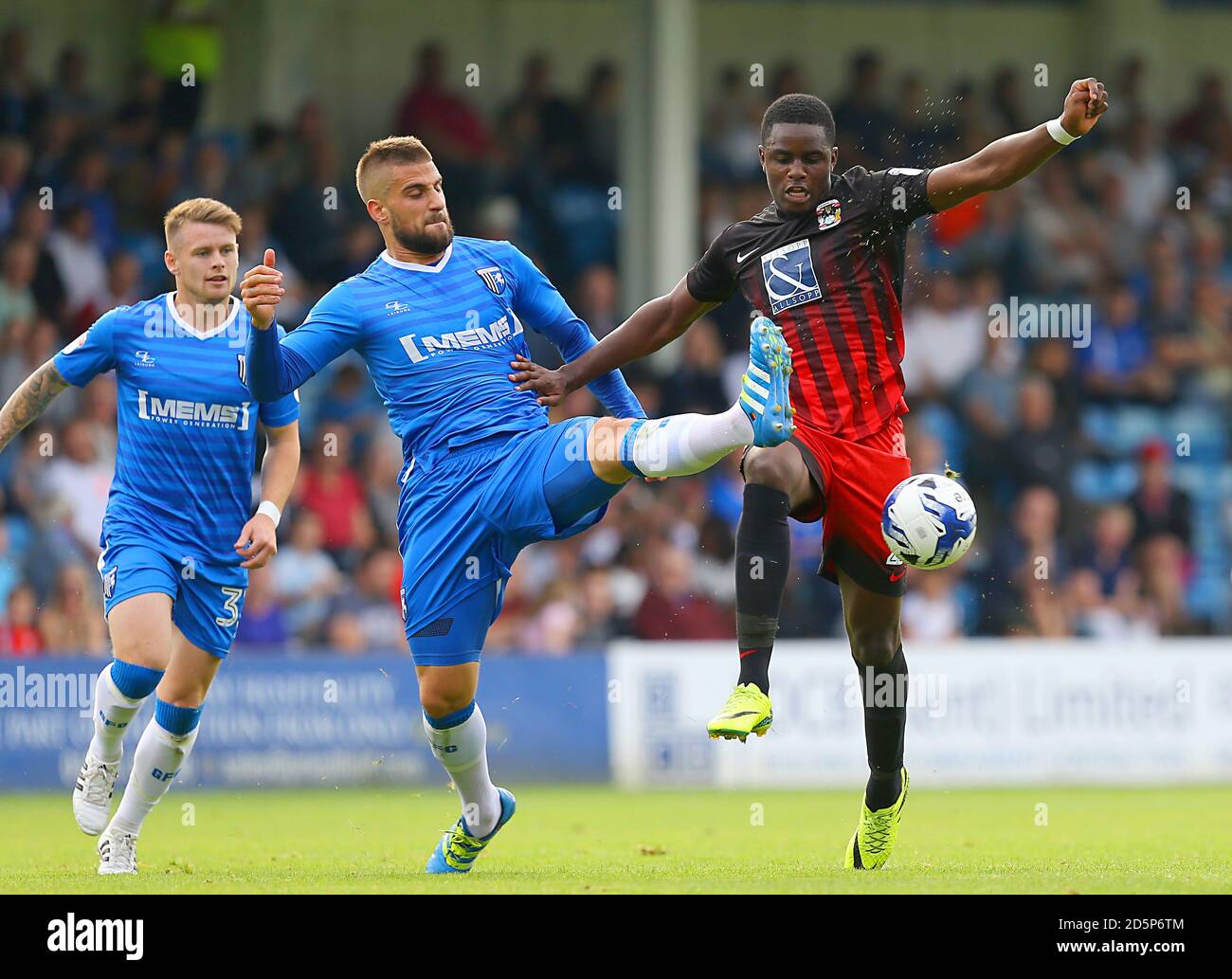 Gillingham's Max Ehmer and Coventry City's Andre Wright battle for the ...