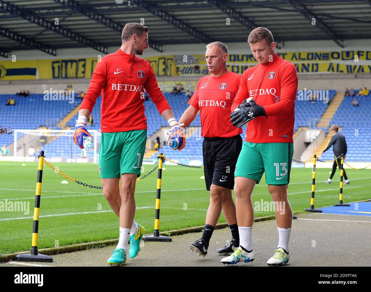Charlton Athletic's Declan Rudd (left), Dillon Phillips (right) and ...