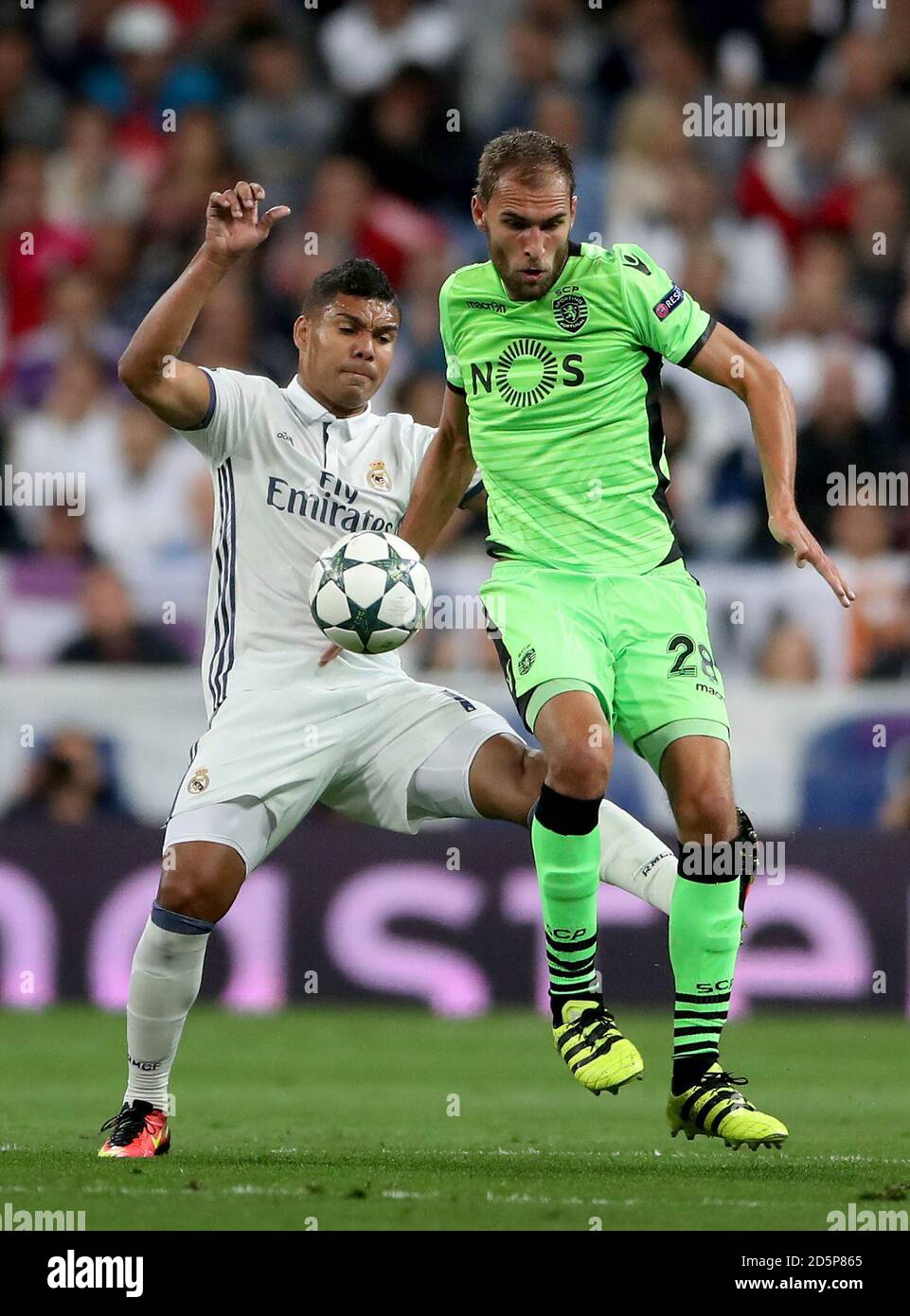Casemiro (left) and Bas Dost (right) battle for the ball Stock Photo ...
