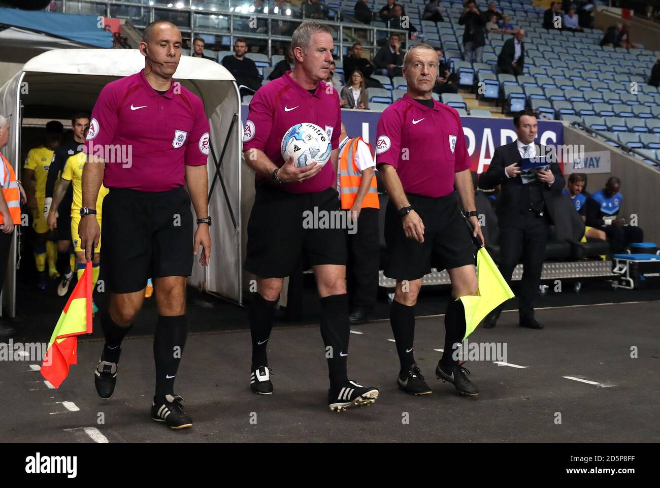 Referee Mark Heywood and his assistants Nicholas Barnard and Paul ...