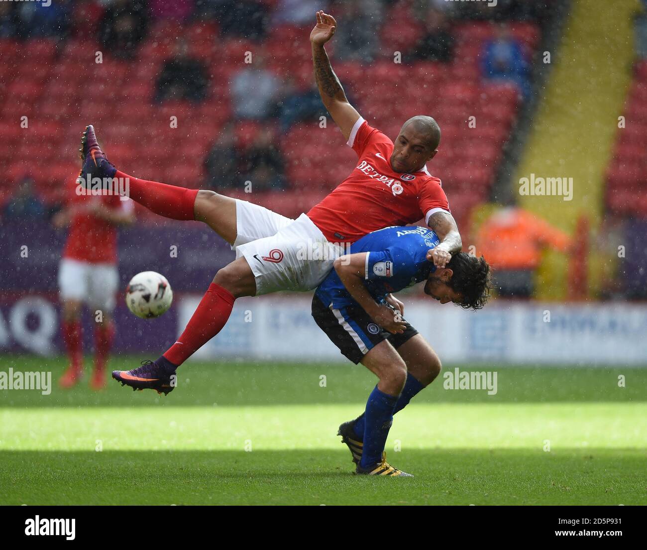 Charlton Athletic's Josh Magennis (left) and RochdaleÕs Joe Rafferty ...