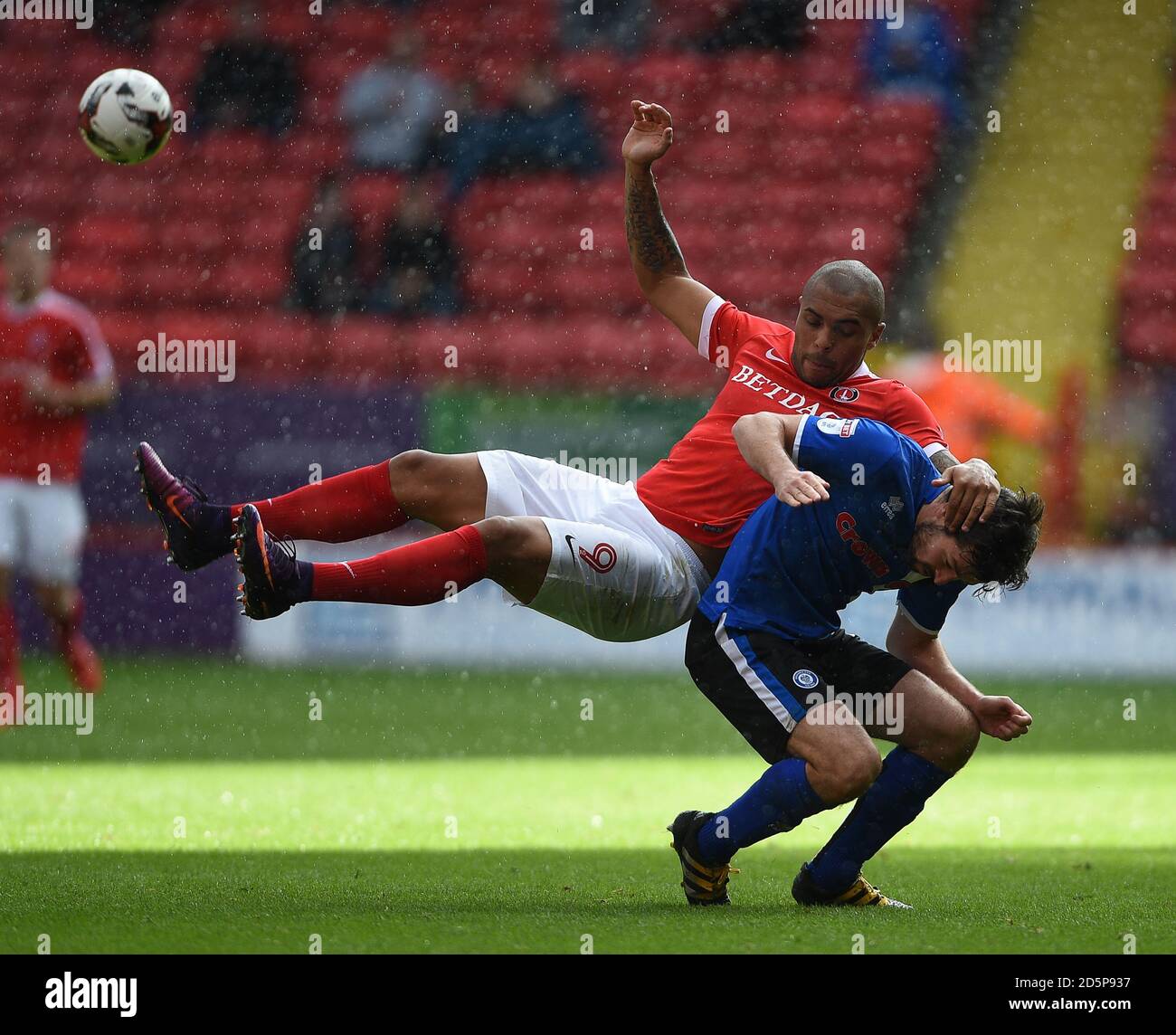 Charlton Athletic's Josh Magennis (left) and RochdaleÕs Joe Rafferty ...